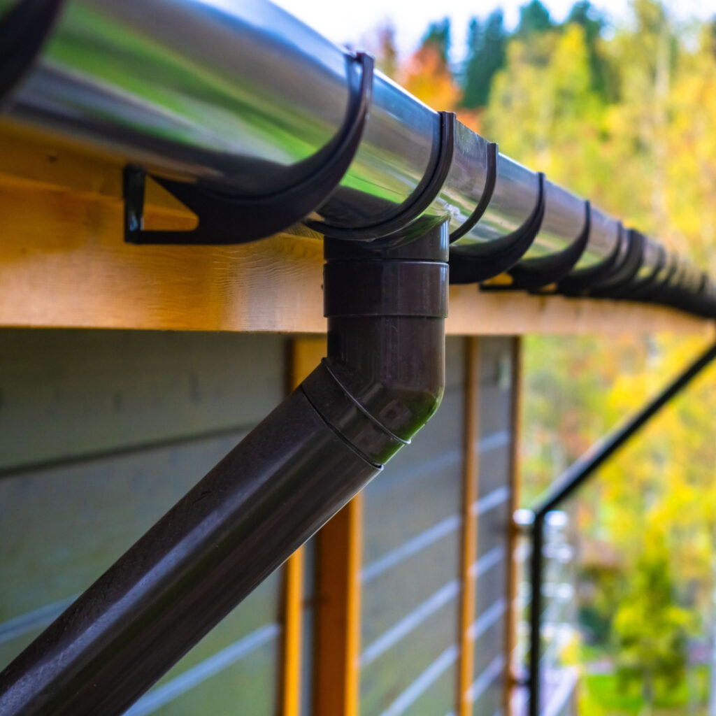 Adjustable gutter brackets for PVC rainwater systems